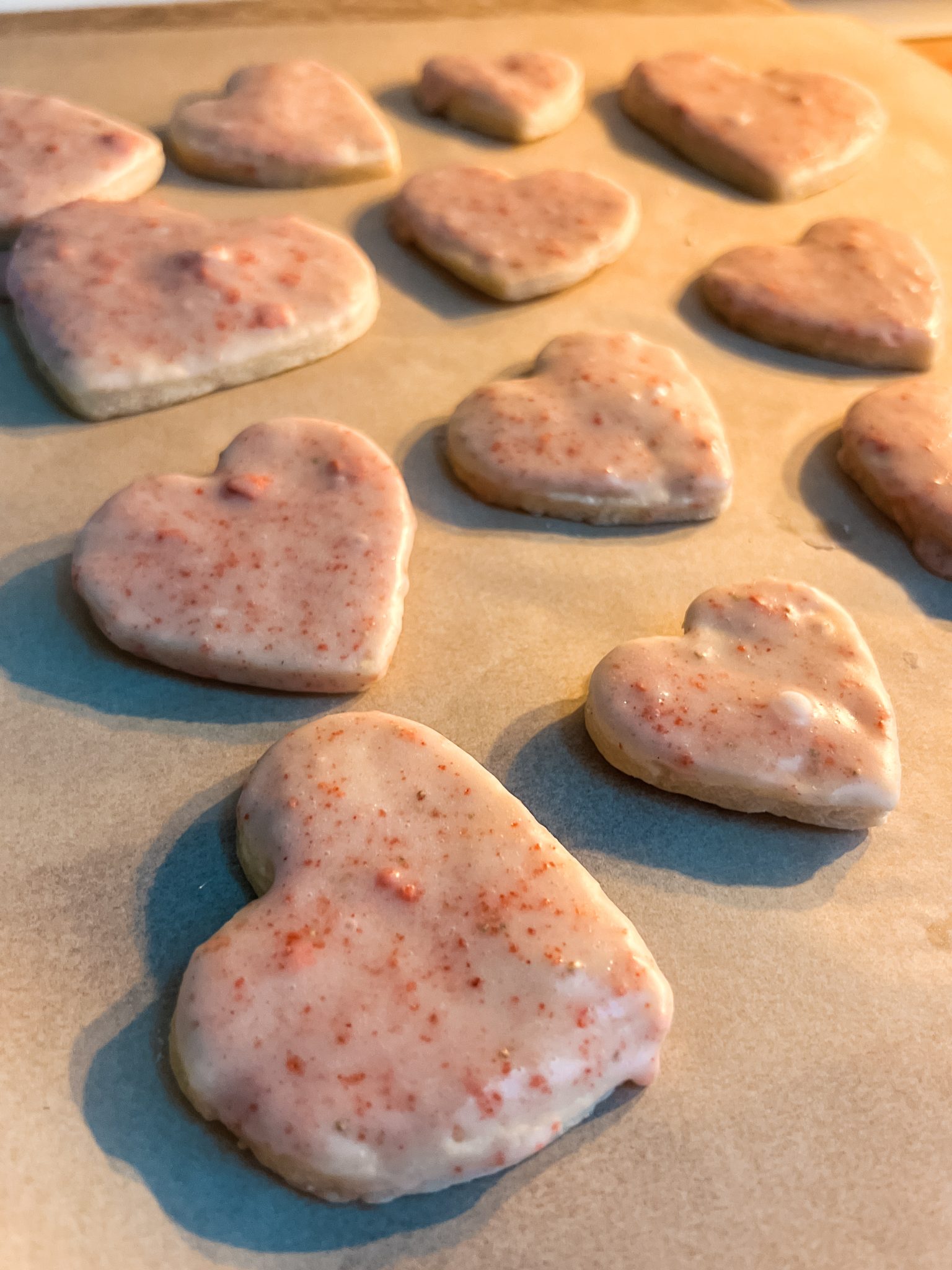 Heart Shaped Shortbread Cookies with Strawberry Speckled Glaze - Salted ...